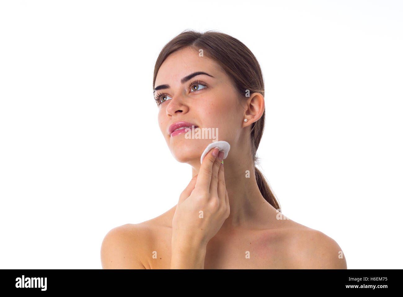 Young woman using cotton pads Stock Photo - Alamy