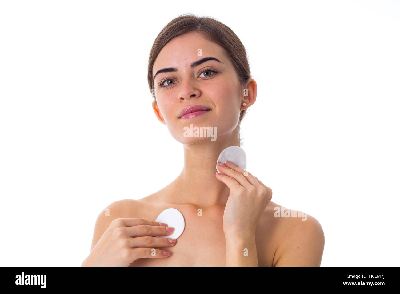 Young woman using cotton pads Stock Photo - Alamy