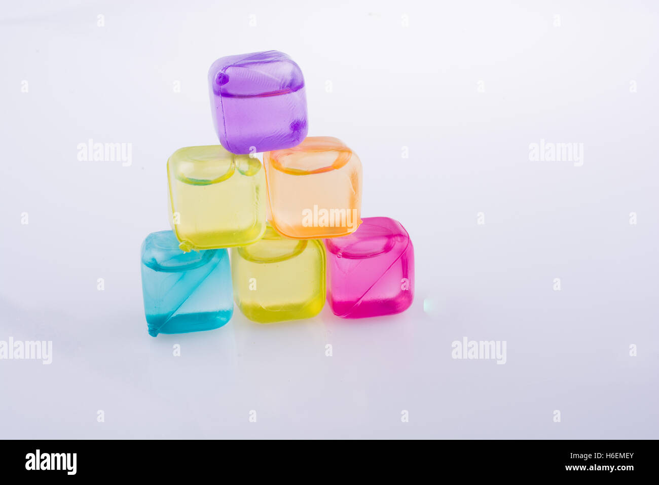 Fake colorful ice cubes on a white background Stock Photo - Alamy