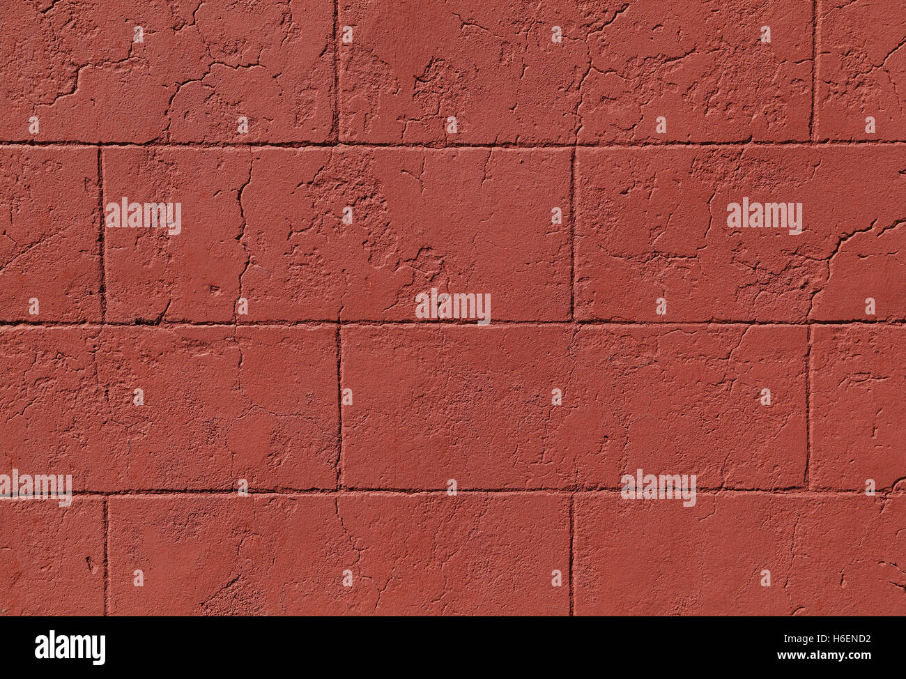 Red cinder block wall forms a pattern that can be used for backgrounds ...