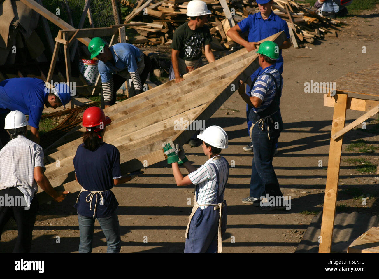 Men volunteers building wall habitat hi-res stock photography and ...