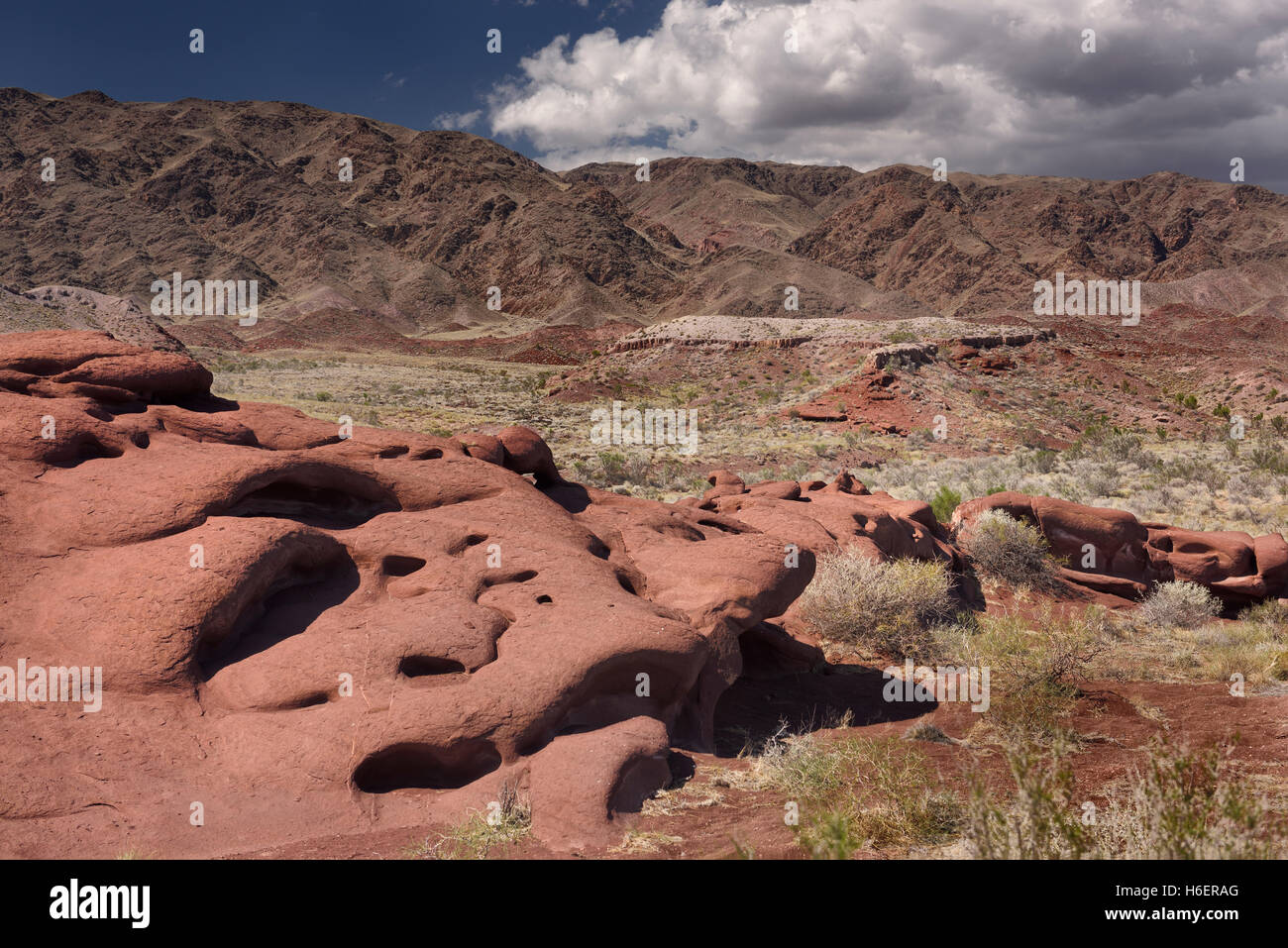 Outcrop of eroded red lava rock at Katutau Mountains Altyn Emel ...