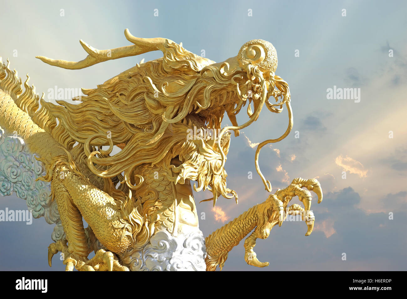 chinese golden dragon statue beautiful sky background Stock Photo - Alamy