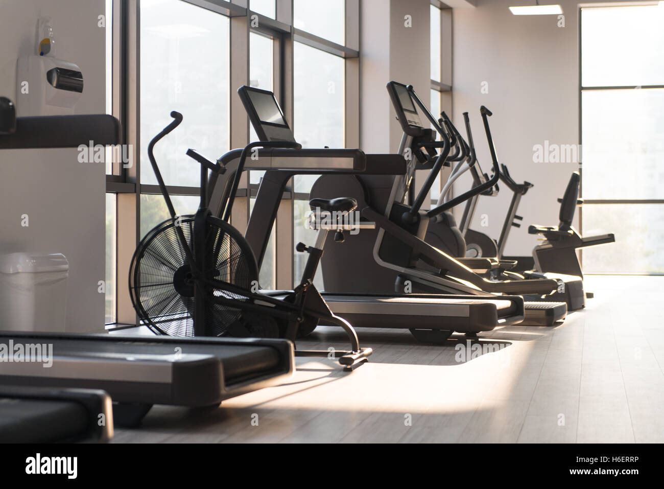 Modern Gym Room Fitness Center With Equipment And Machines Stock Photo ...