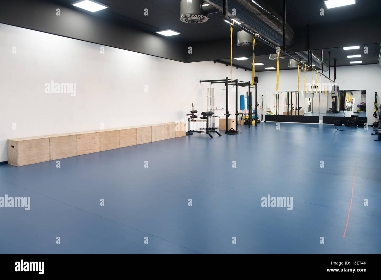 Modern Gym Room Fitness Center With Equipment And Machines Stock Photo ...