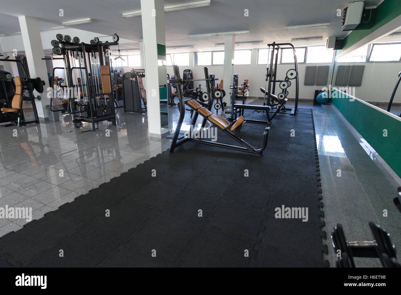 Modern Gym Room Fitness Center With Equipment And Machines Stock Photo ...