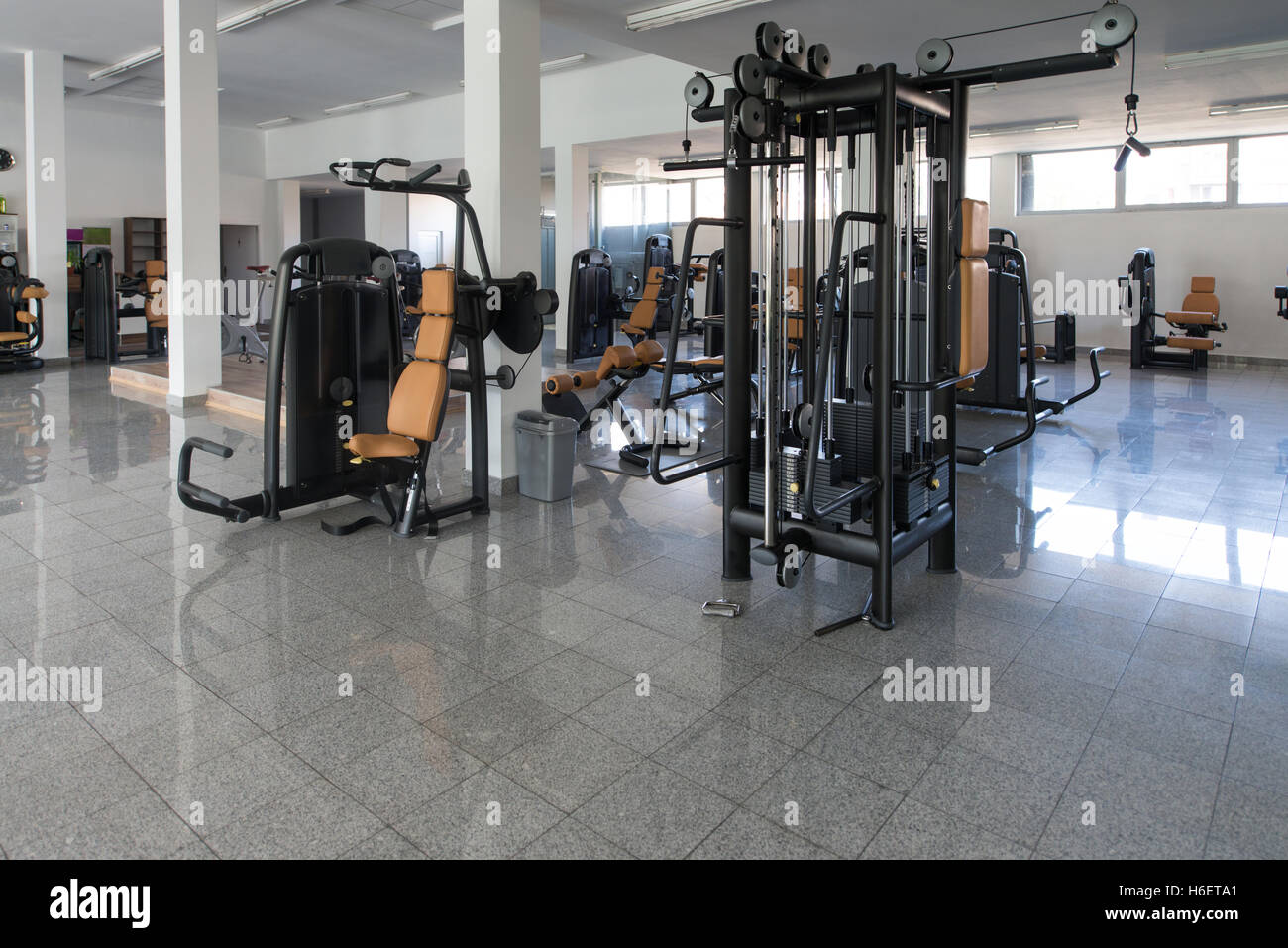Modern Gym Room Fitness Center With Equipment And Machines Stock Photo ...
