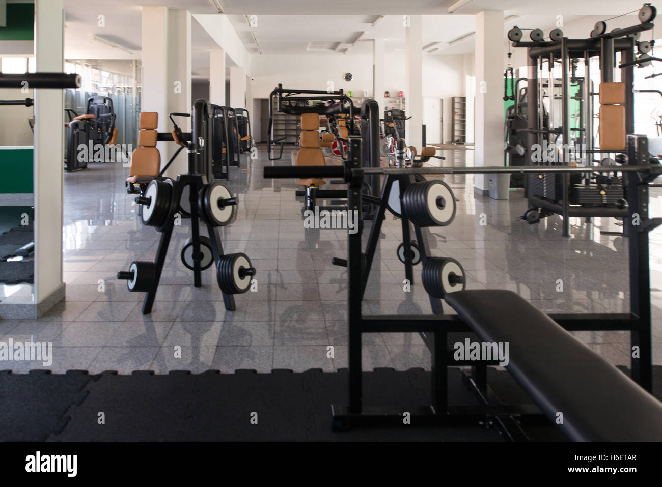 Modern Gym Room Fitness Center With Equipment And Machines Stock Photo ...