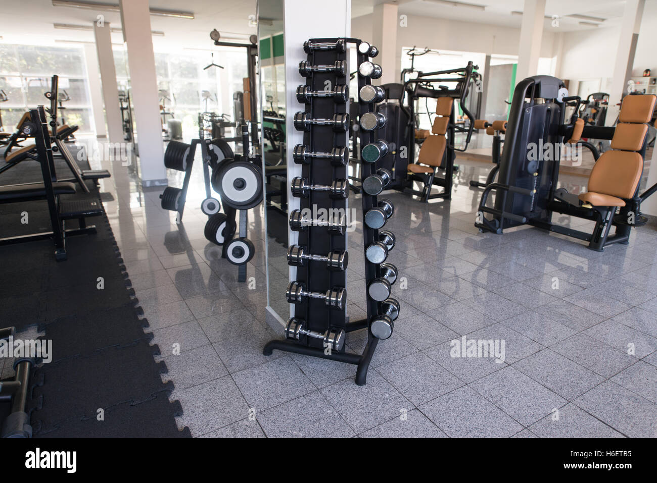 Modern Gym Room Fitness Center With Equipment And Machines Stock Photo ...