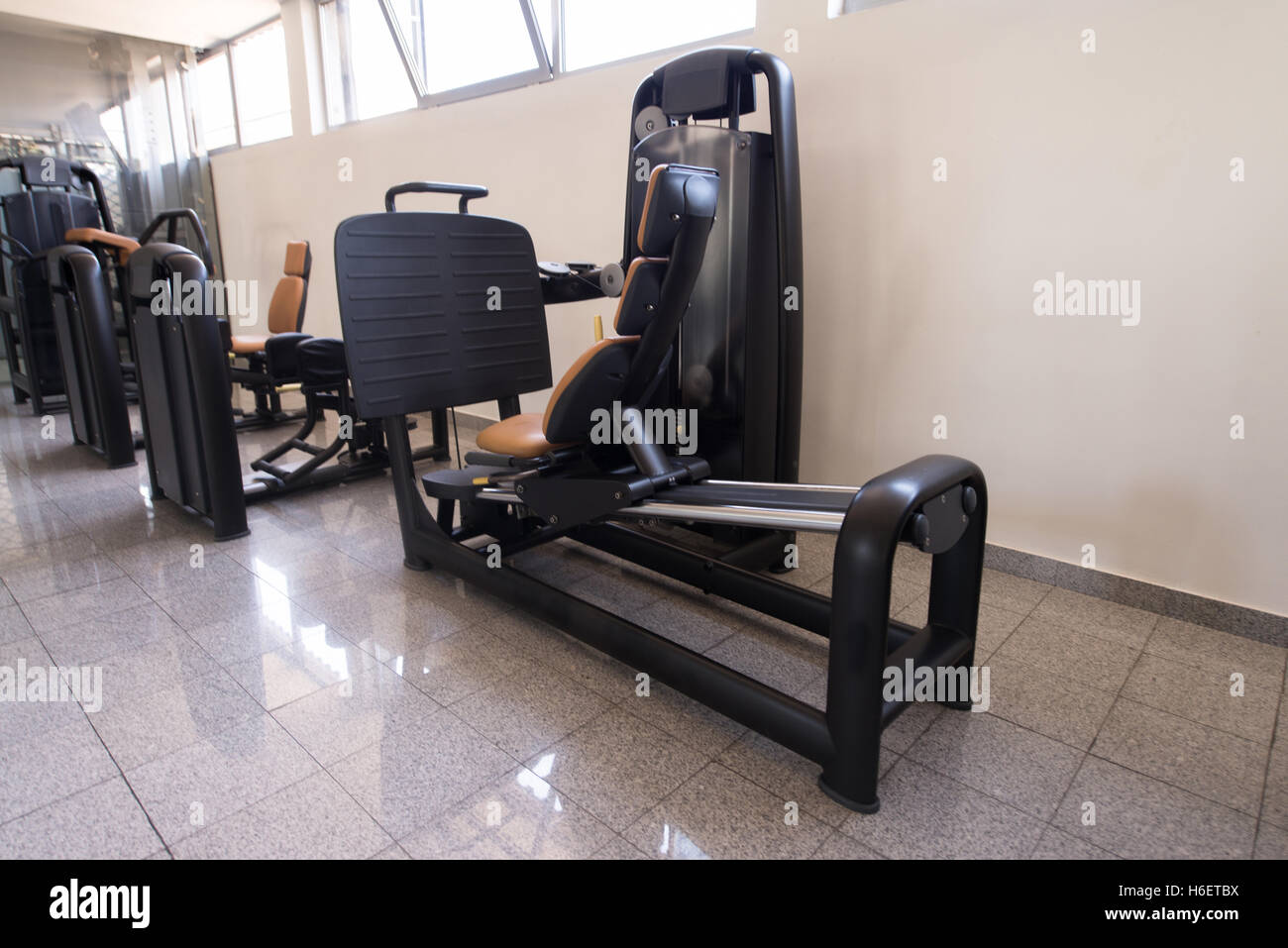 Modern Gym Room Fitness Center With Equipment And Machines Stock Photo ...