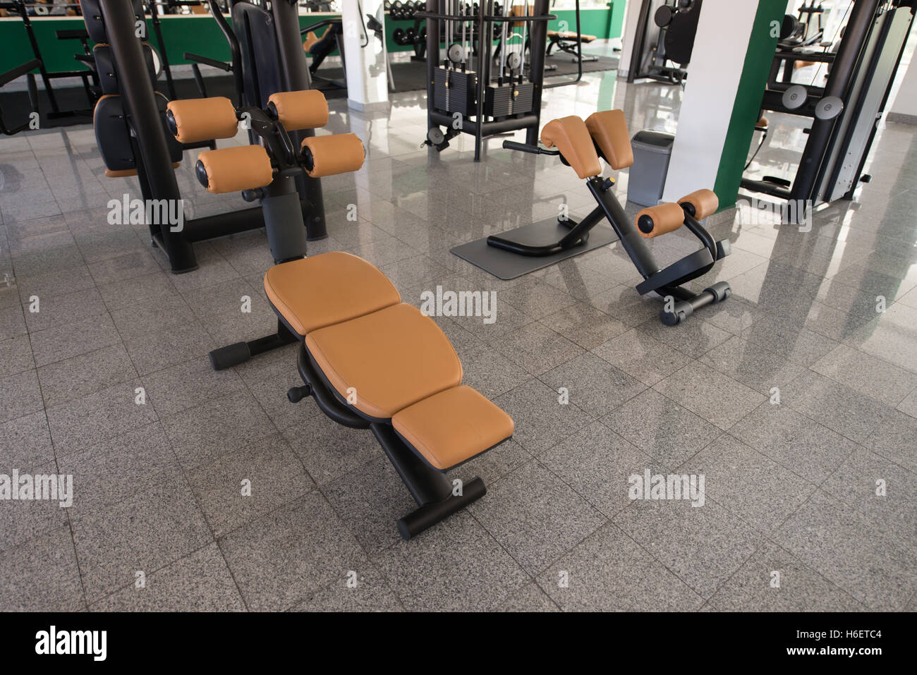 Modern Gym Room Fitness Center With Equipment And Machines Stock Photo ...