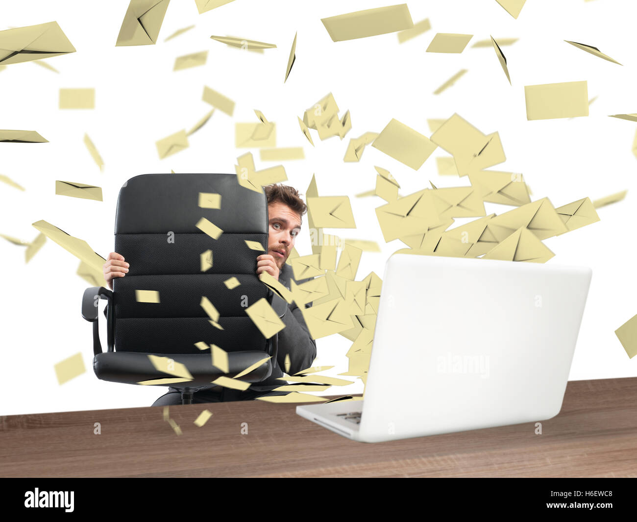 Scared by too many email Stock Photo - Alamy
