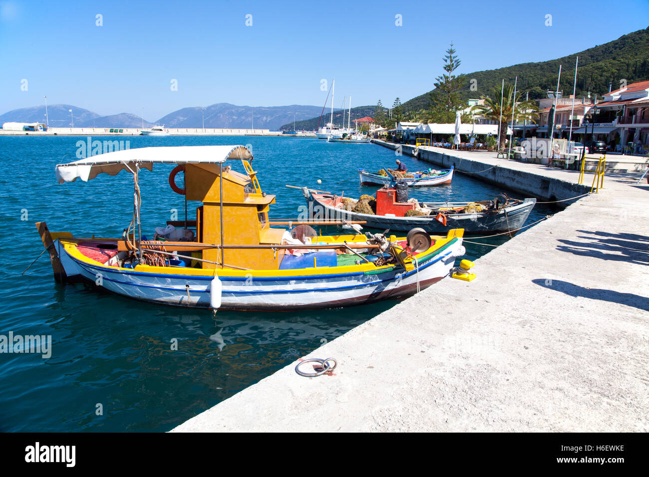 Brightly coloured fishing boat in the harbour at Sami on the Greek ...