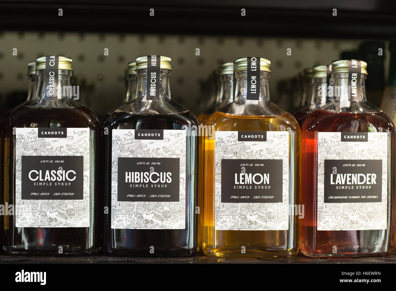 Bottles of gourmet natural, small batch, cold steeped syrups on grocery ...