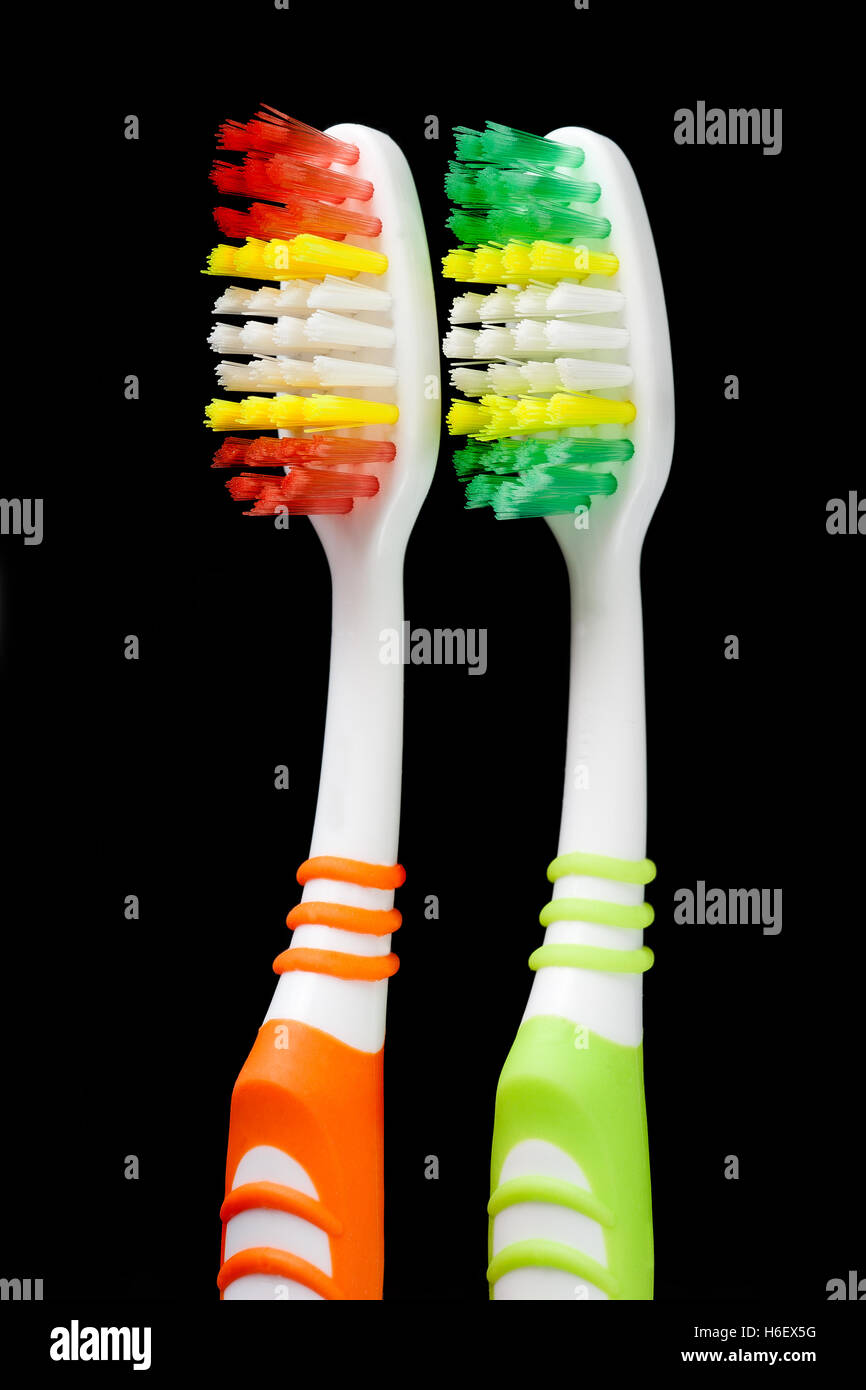 Two Toothbrushes isolated on black Stock Photo - Alamy Two Toothbrushes isolated on black Stock Photo - Alamy