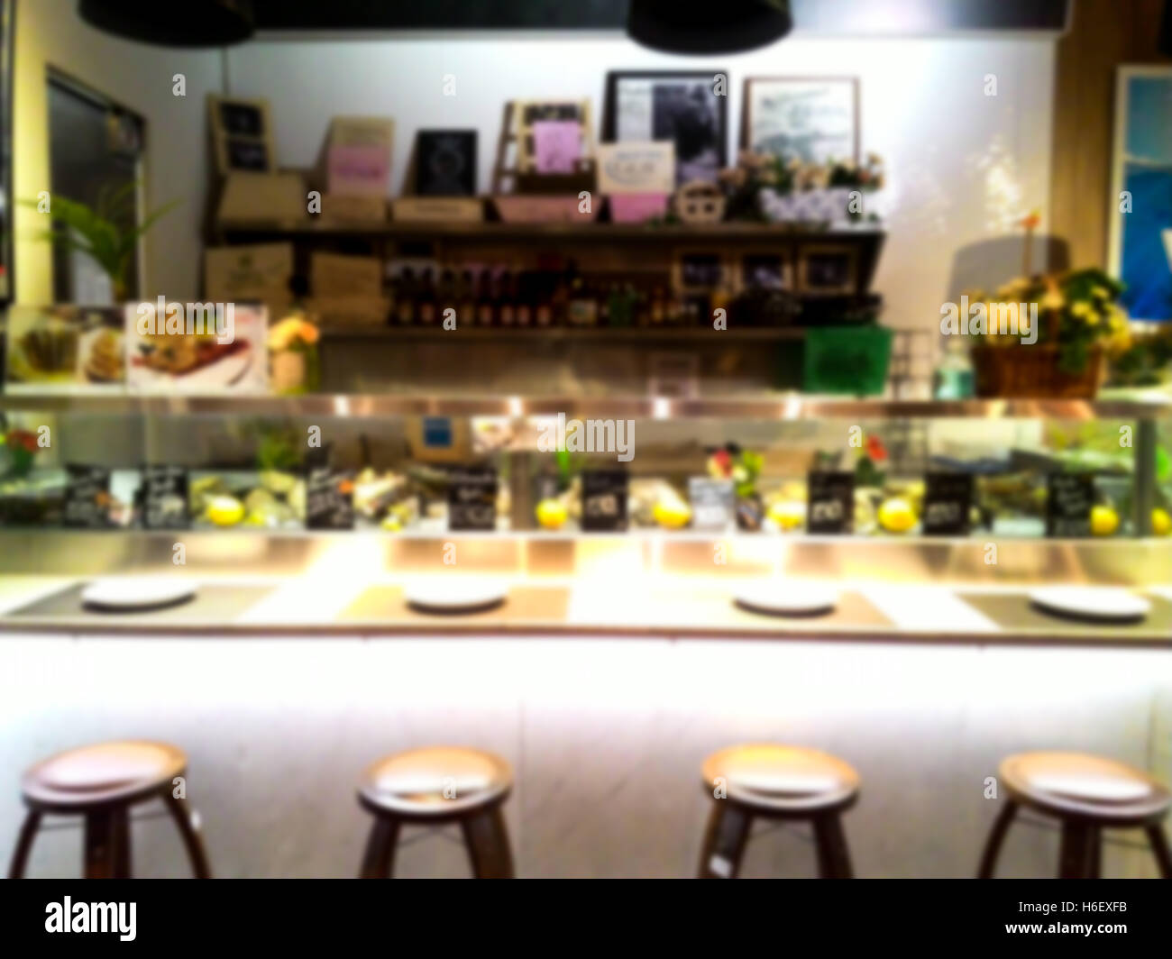 sushi bar with blur background Stock Photo - Alamy