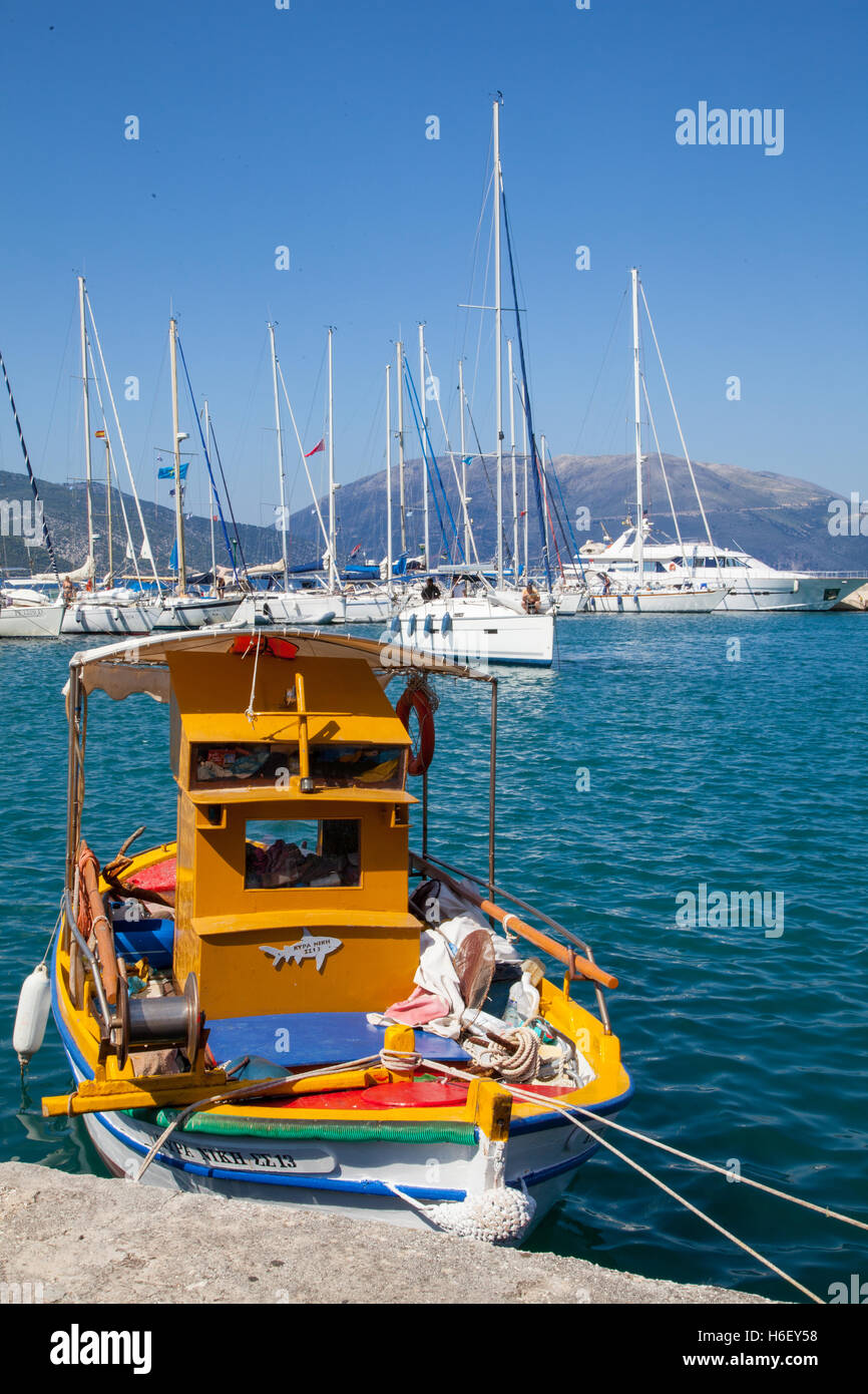Brightly coloured fishing boat in the harbour at Sami on the Greek ...