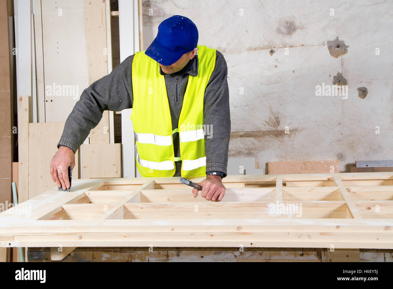 carpenter making a door in a workshop Stock Photo - Alamy