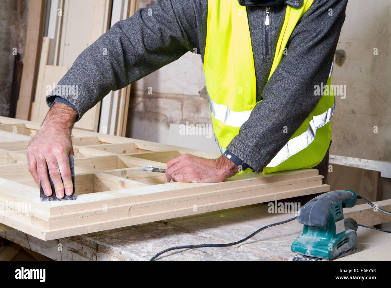 carpenter making a door in a workshop Stock Photo - Alamy