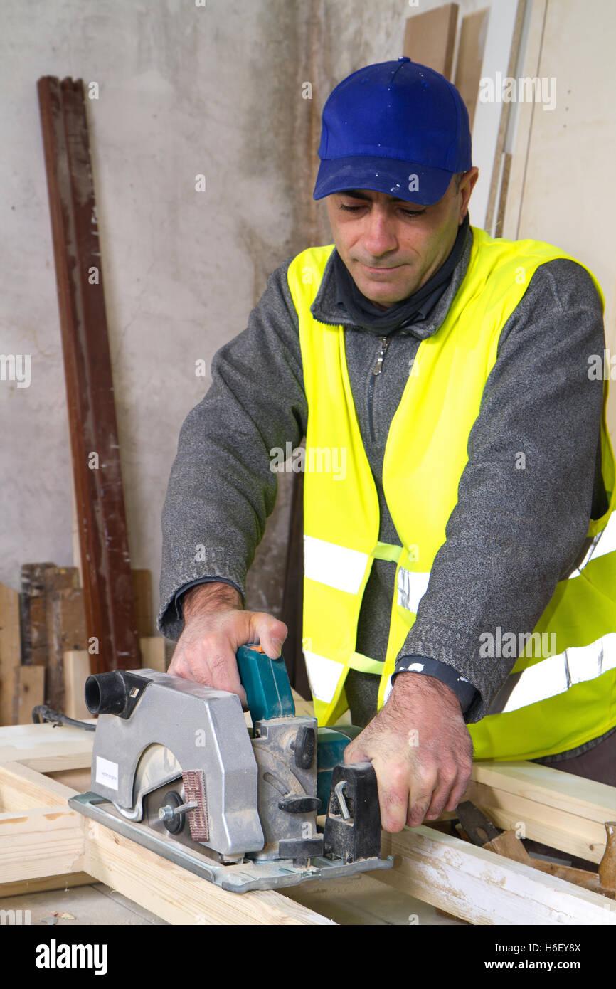 carpenter making a door in a workshop Stock Photo - Alamy