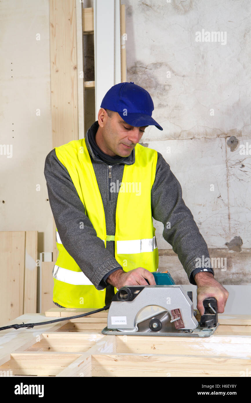 carpenter making a door in a workshop Stock Photo - Alamy