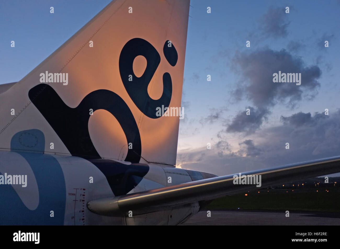 The tail of a Flybe jet at Exeter airport Stock Photo - Alamy
