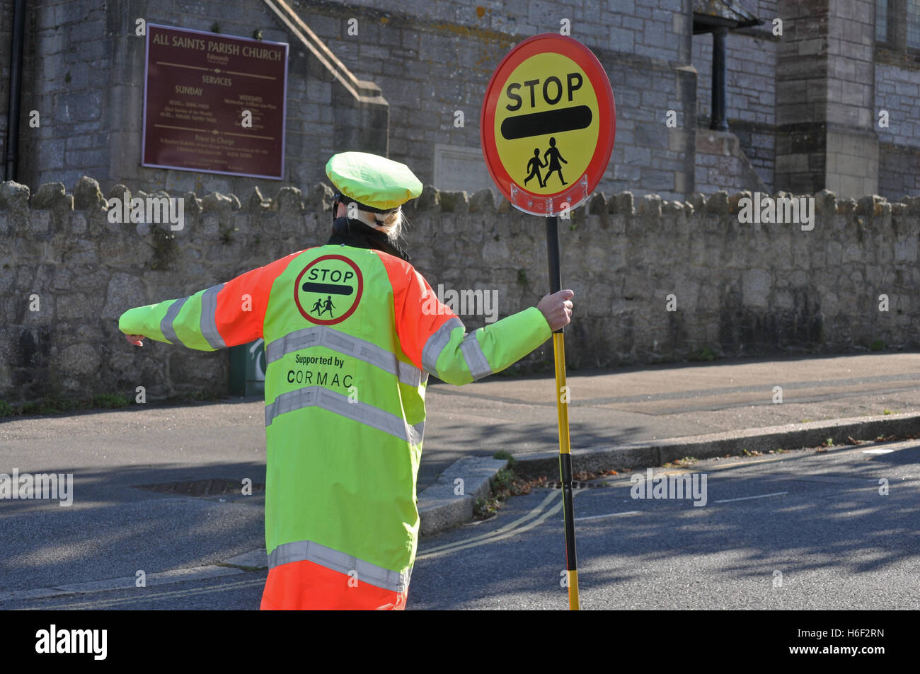 A lollipop lady in Falmouth, UK Stock Photo - Alamy