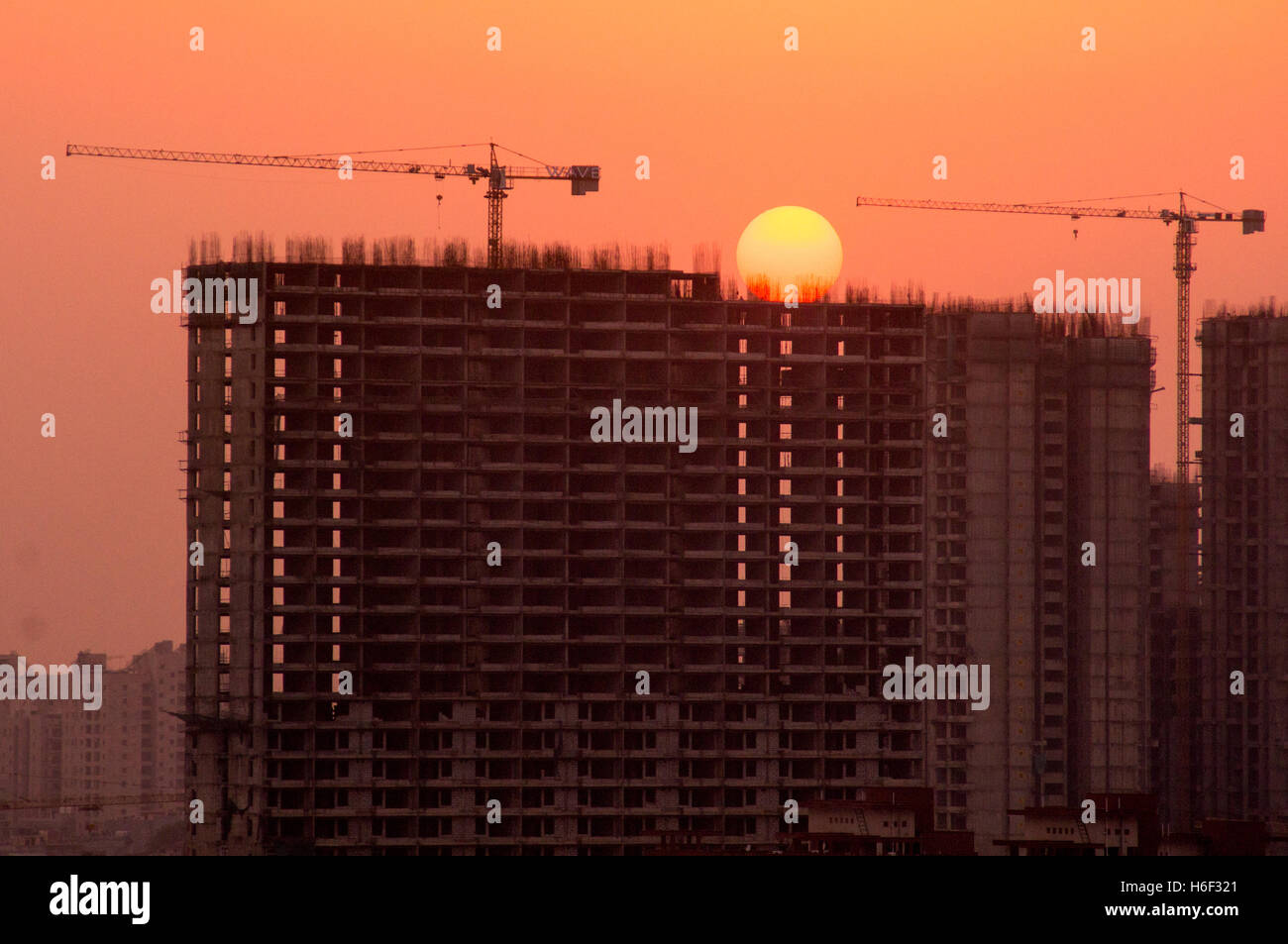 Silhouette of partially completed building in Noida Stock Photo - Alamy