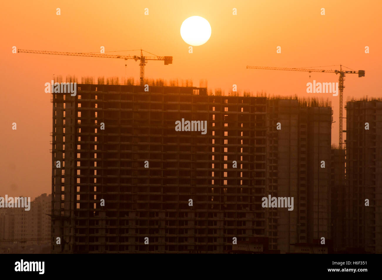 Silhouette of partially completed building in Noida Stock Photo - Alamy