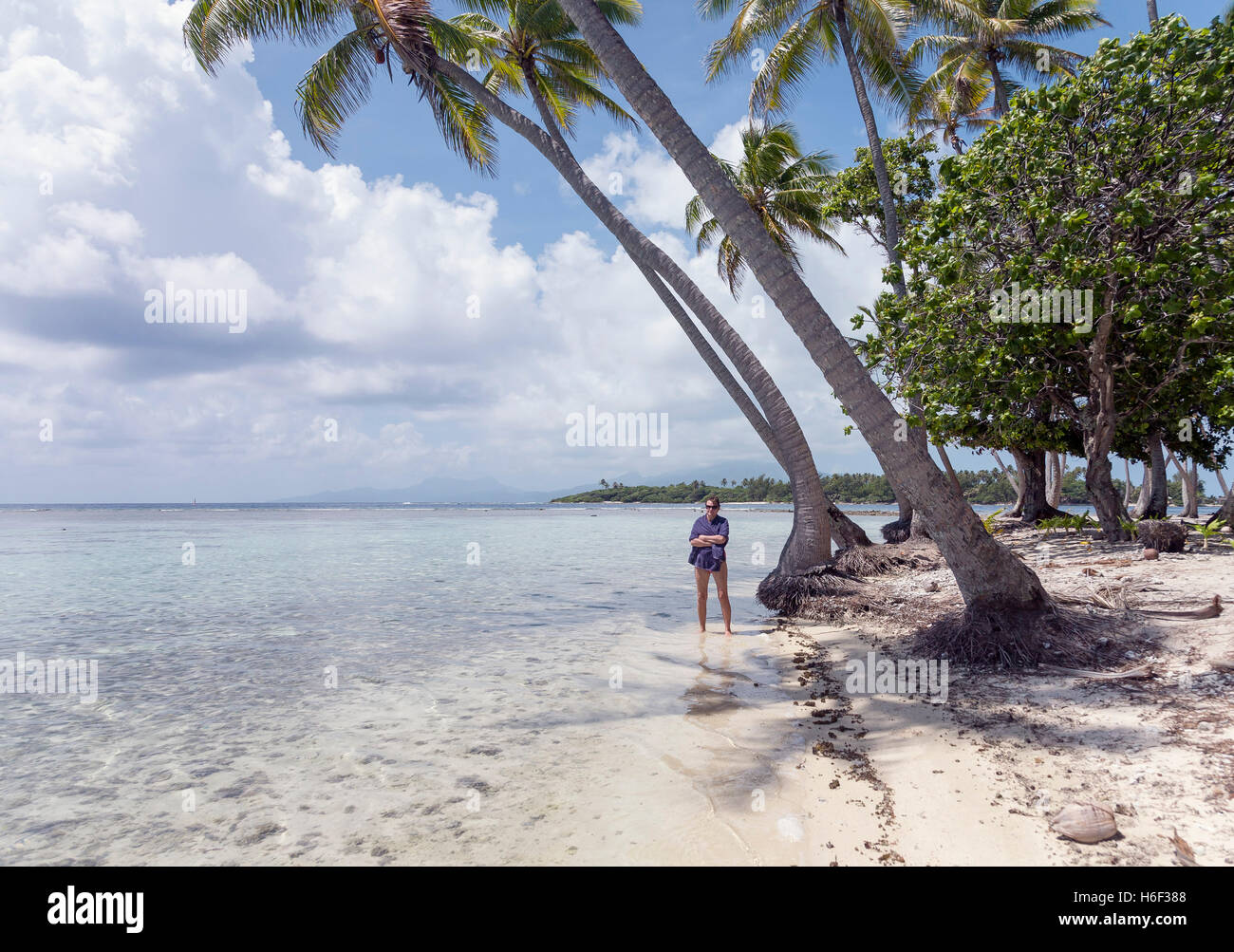 Woman on tropical beach, Polynesia Stock Photo - Alamy