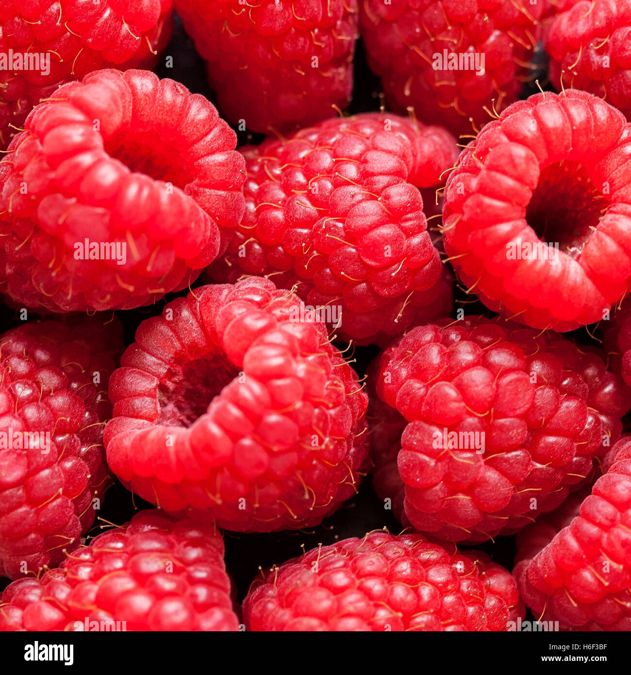 Raspberries background hi-res stock photography and images - Alamy