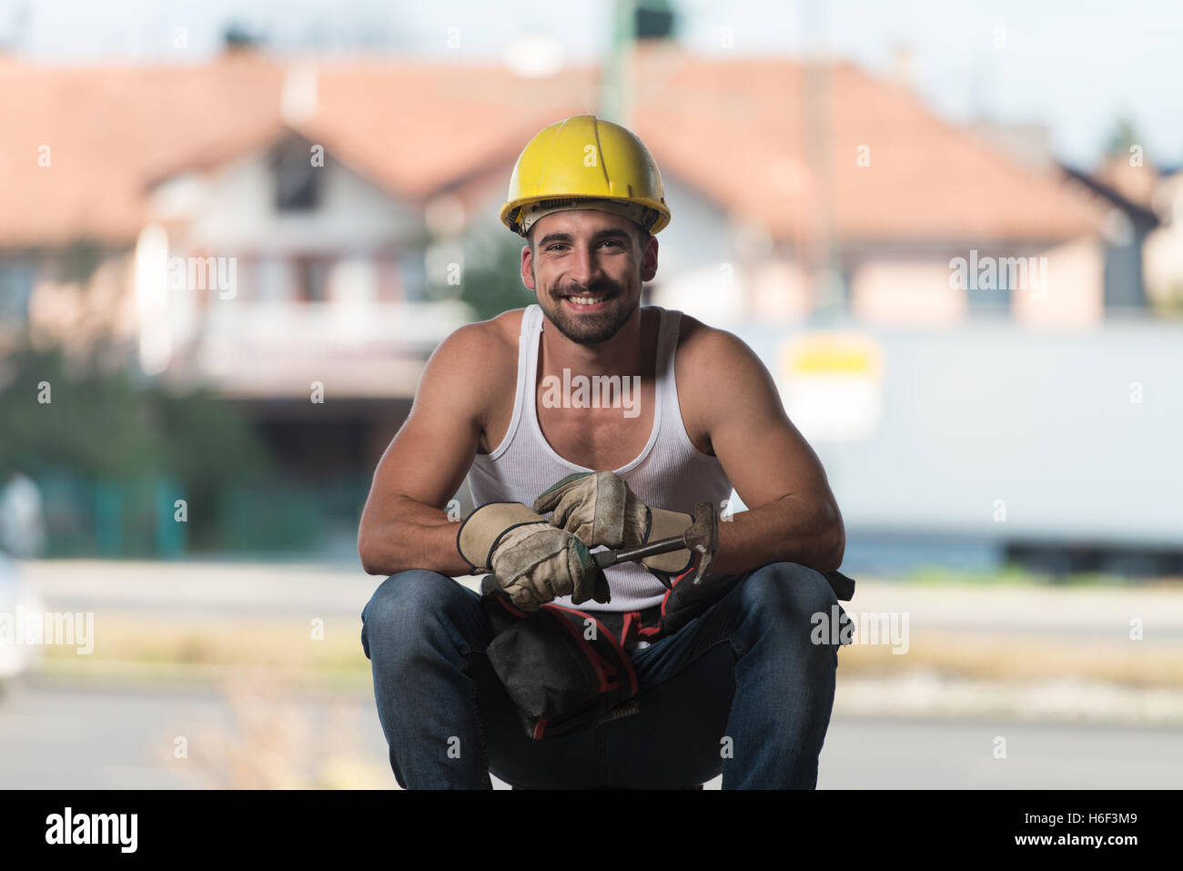 Construction Worker Relaxing The Fresh Air During Work Stock Photo - Alamy