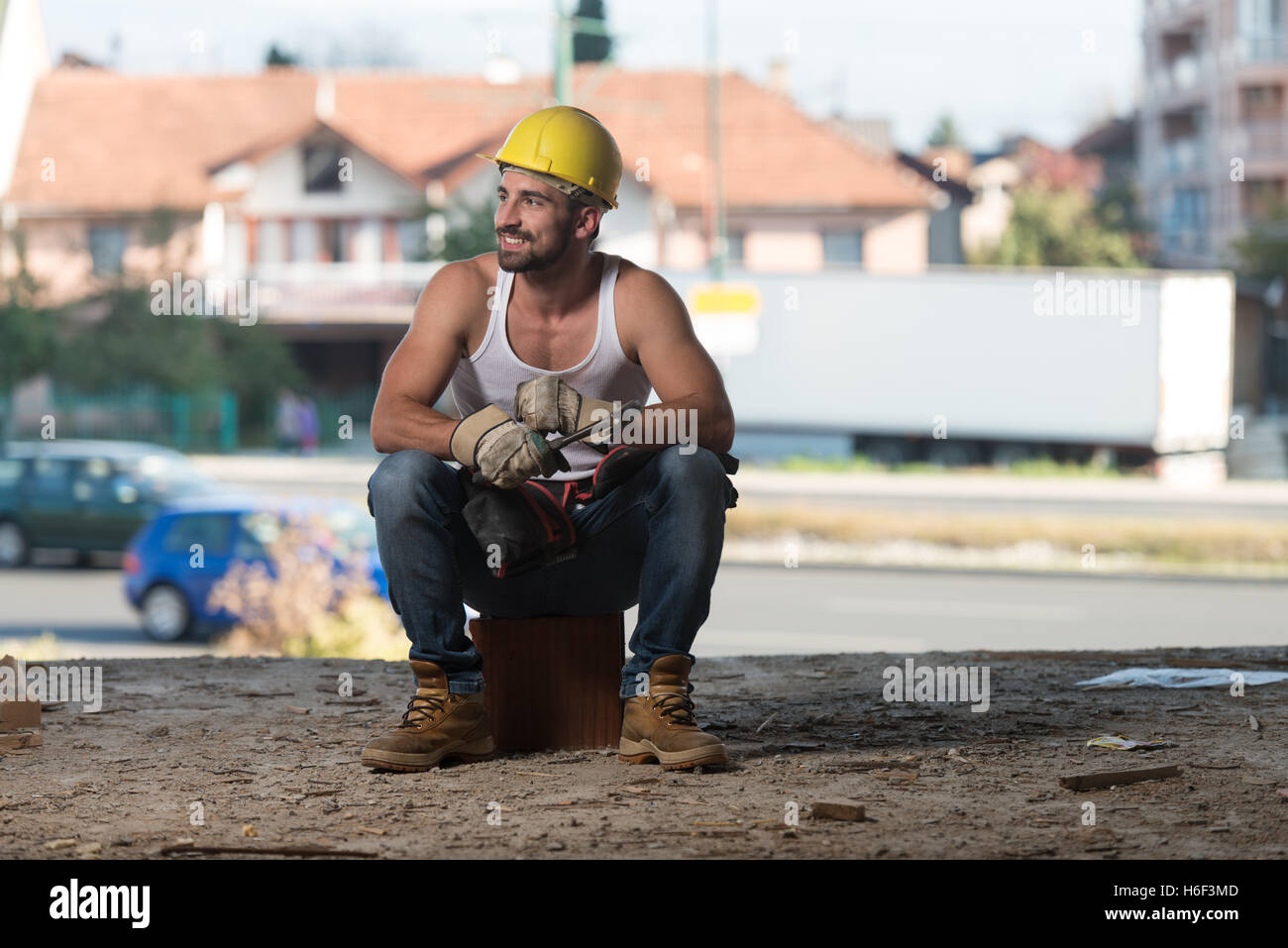 Construction Worker Relaxing The Fresh Air During Work Stock Photo - Alamy