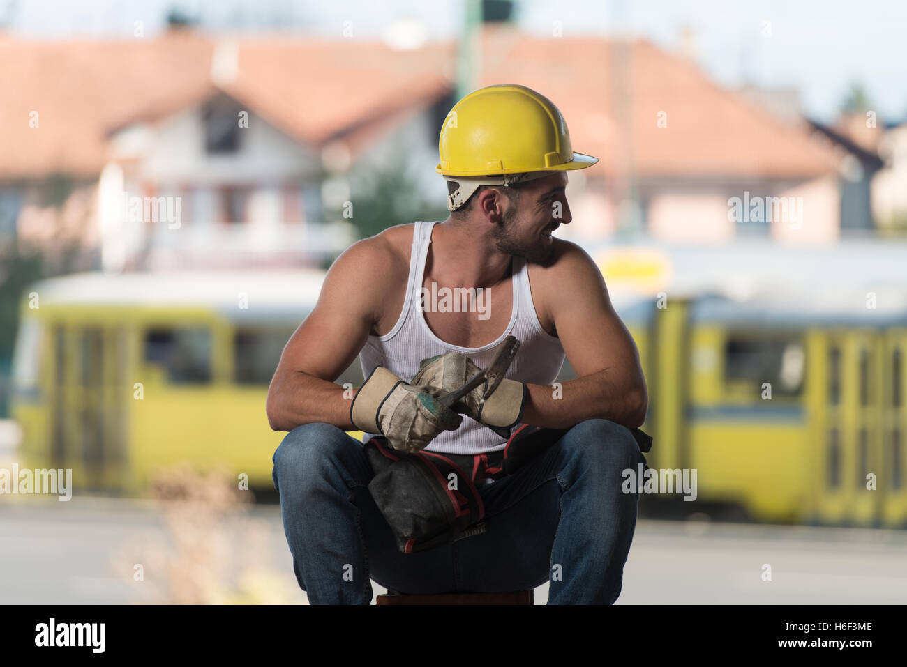 Construction Worker Relaxing The Fresh Air During Work Stock Photo - Alamy