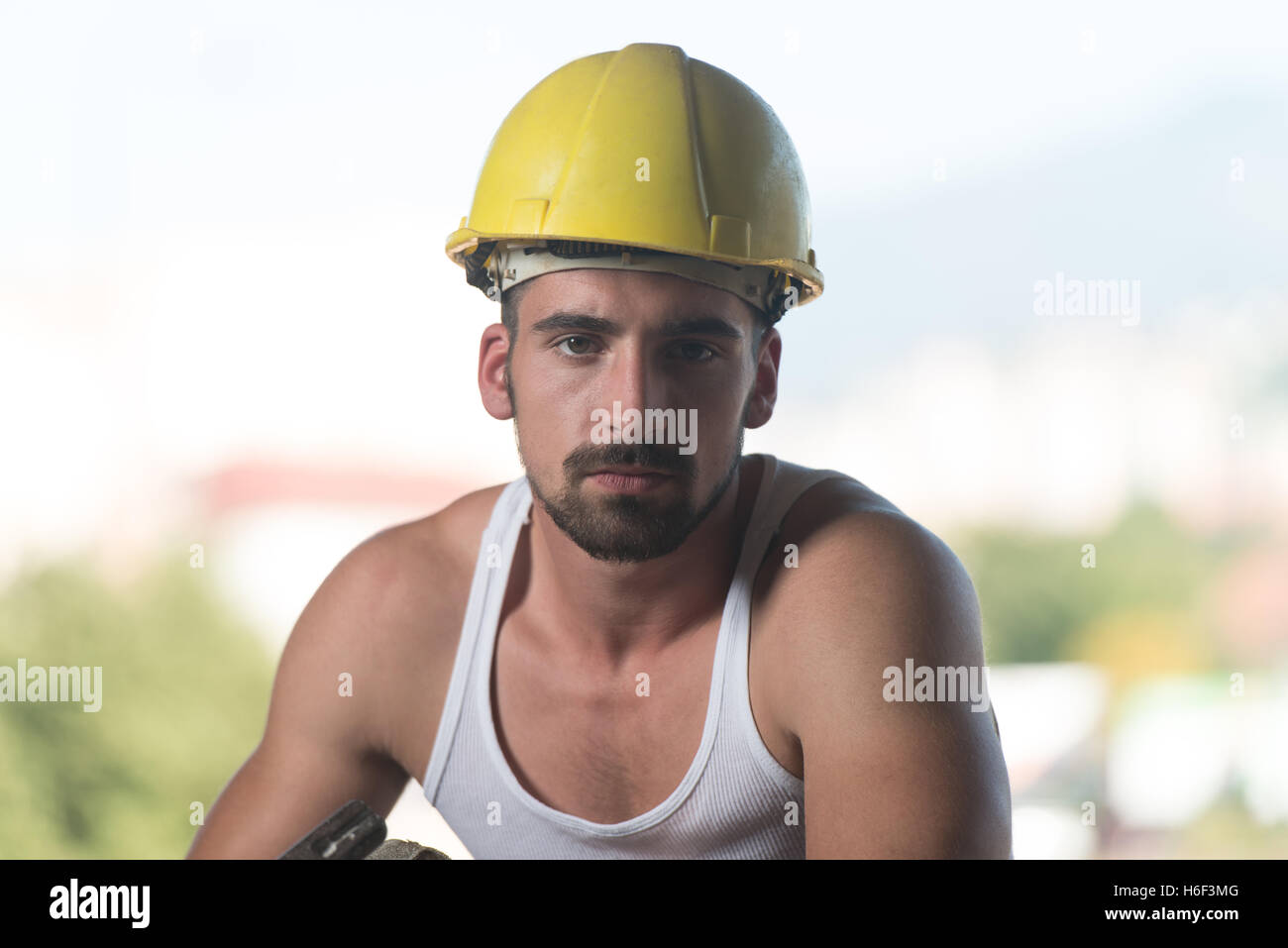 Construction Worker Relaxing The Fresh Air During Work Stock Photo - Alamy