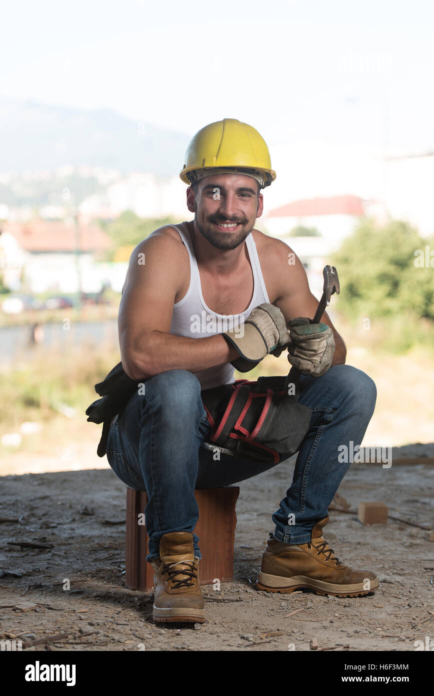 Construction Worker Relaxing The Fresh Air During Work Stock Photo - Alamy
