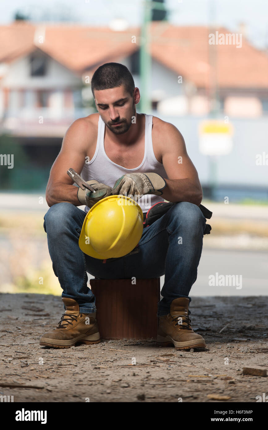 Construction Worker Relaxing The Fresh Air During Work Stock Photo - Alamy