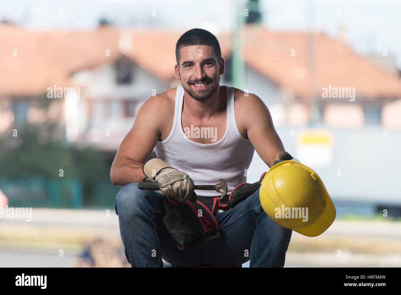 Construction Worker Relaxing The Fresh Air During Work Stock Photo - Alamy