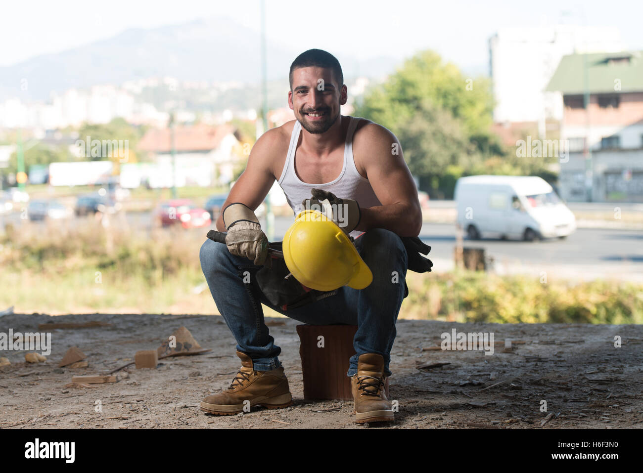 Construction Worker Relaxing The Fresh Air During Work Stock Photo - Alamy