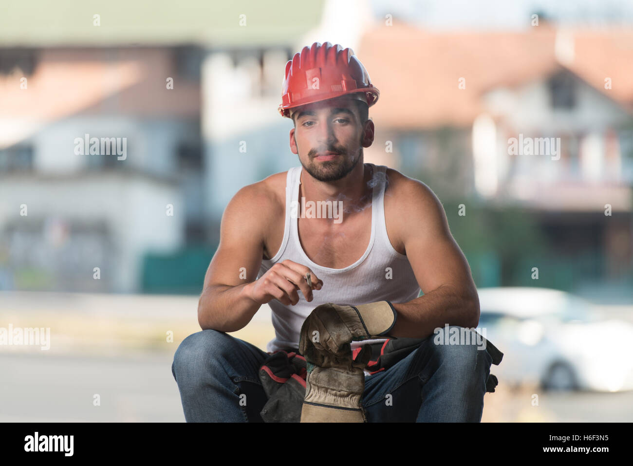 Construction Worker Relaxing The Fresh Air During Work Stock Photo - Alamy