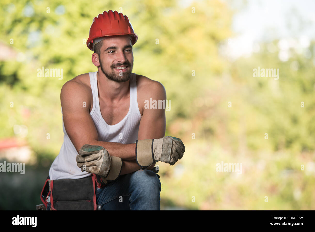 Construction Worker Relaxing The Fresh Air During Work Stock Photo - Alamy