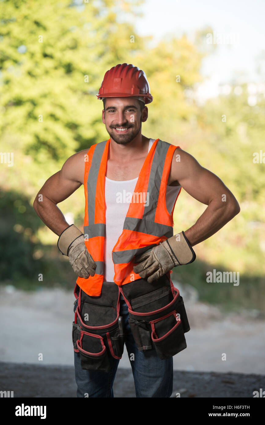 Portrait Of Handsome Male Architect Engineer With Red Helmet Stock ...