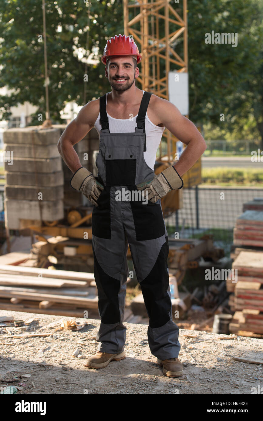 Portrait Of Handsome Male Architect Engineer With Red Helmet Stock ...