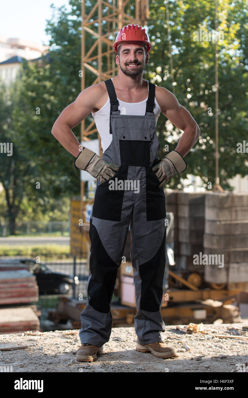 Portrait Of Handsome Male Architect Engineer With Red Helmet Stock ...