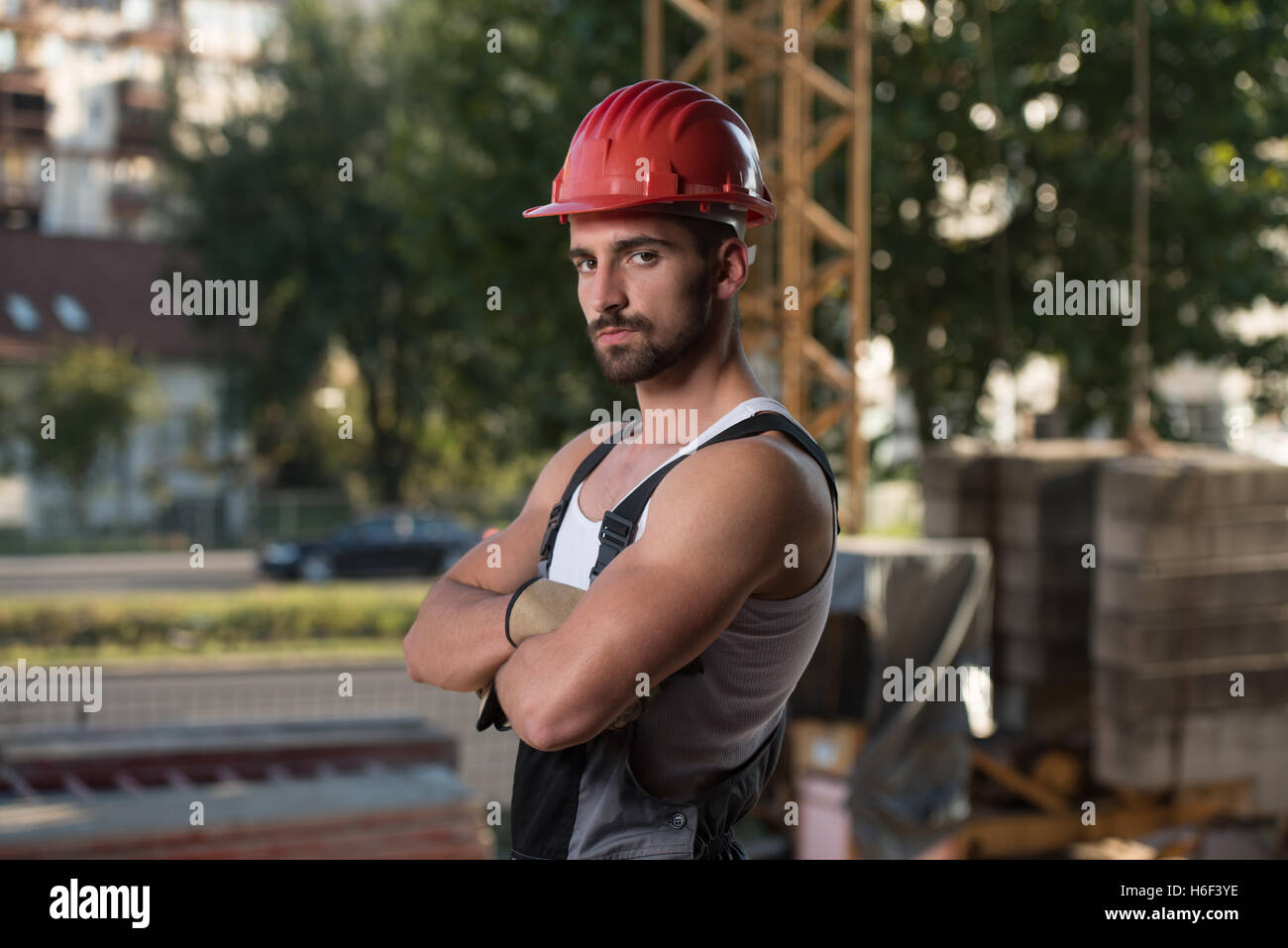 Successful Male Architect At A Building Site With Arms Crossed Stock ...
