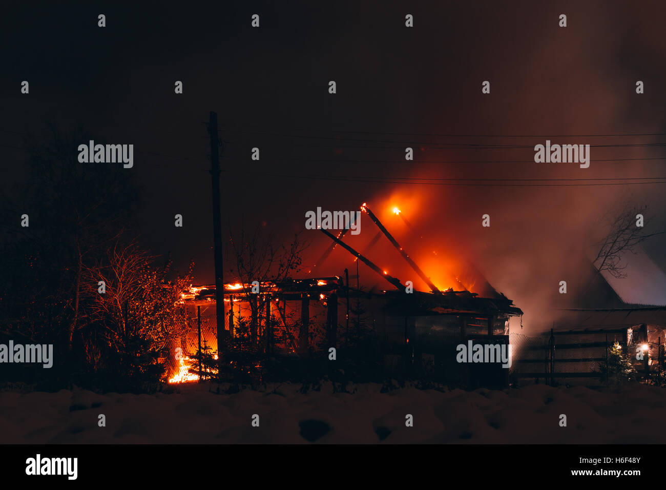 Exploding architecture damaged burning smoke house roof hi-res stock ...
