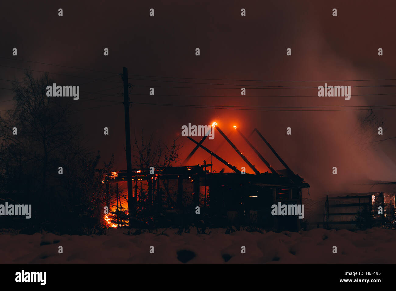 fire in a wooden house at night Stock Photo - Alamy