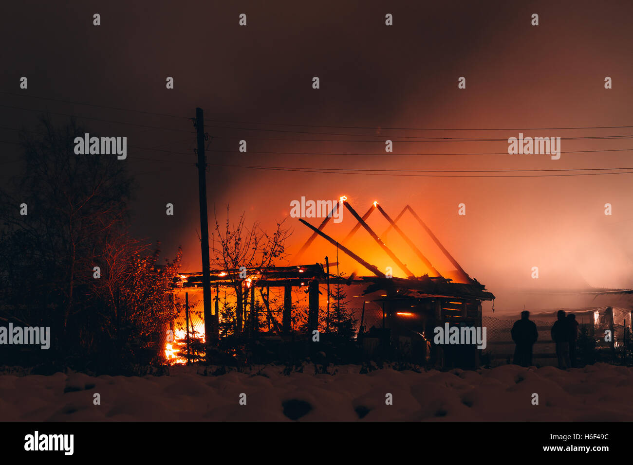 fire in a wooden house at night Stock Photo - Alamy
