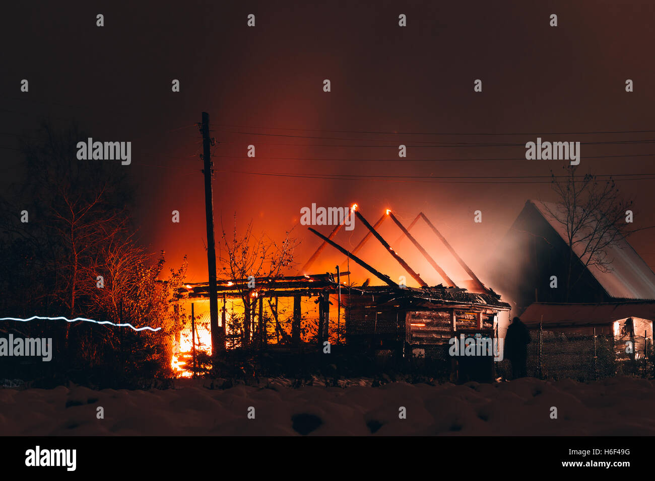fire in a wooden house at night Stock Photo - Alamy