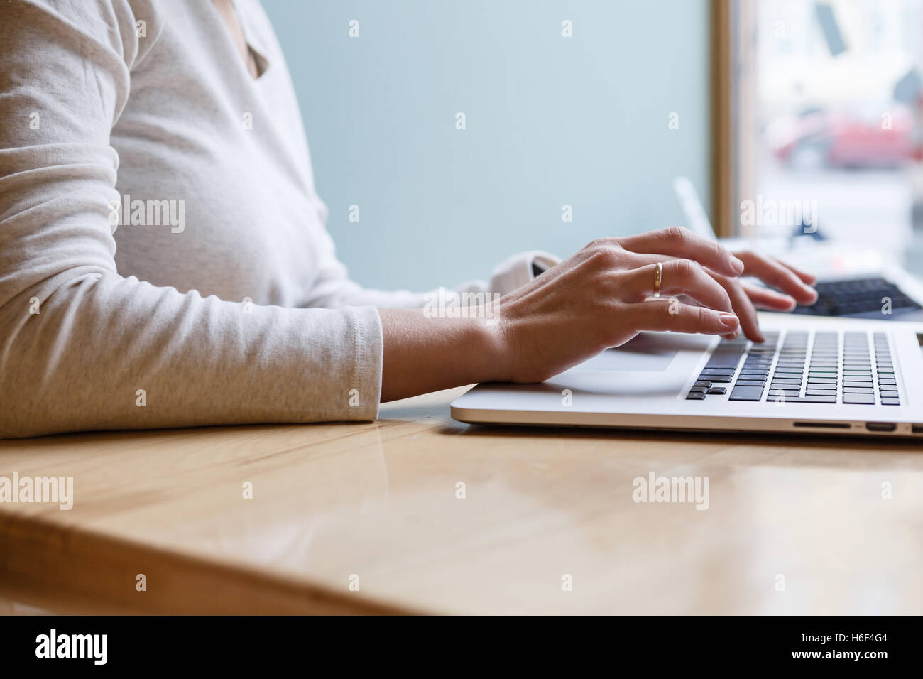Writer types a text Stock Photo - Alamy